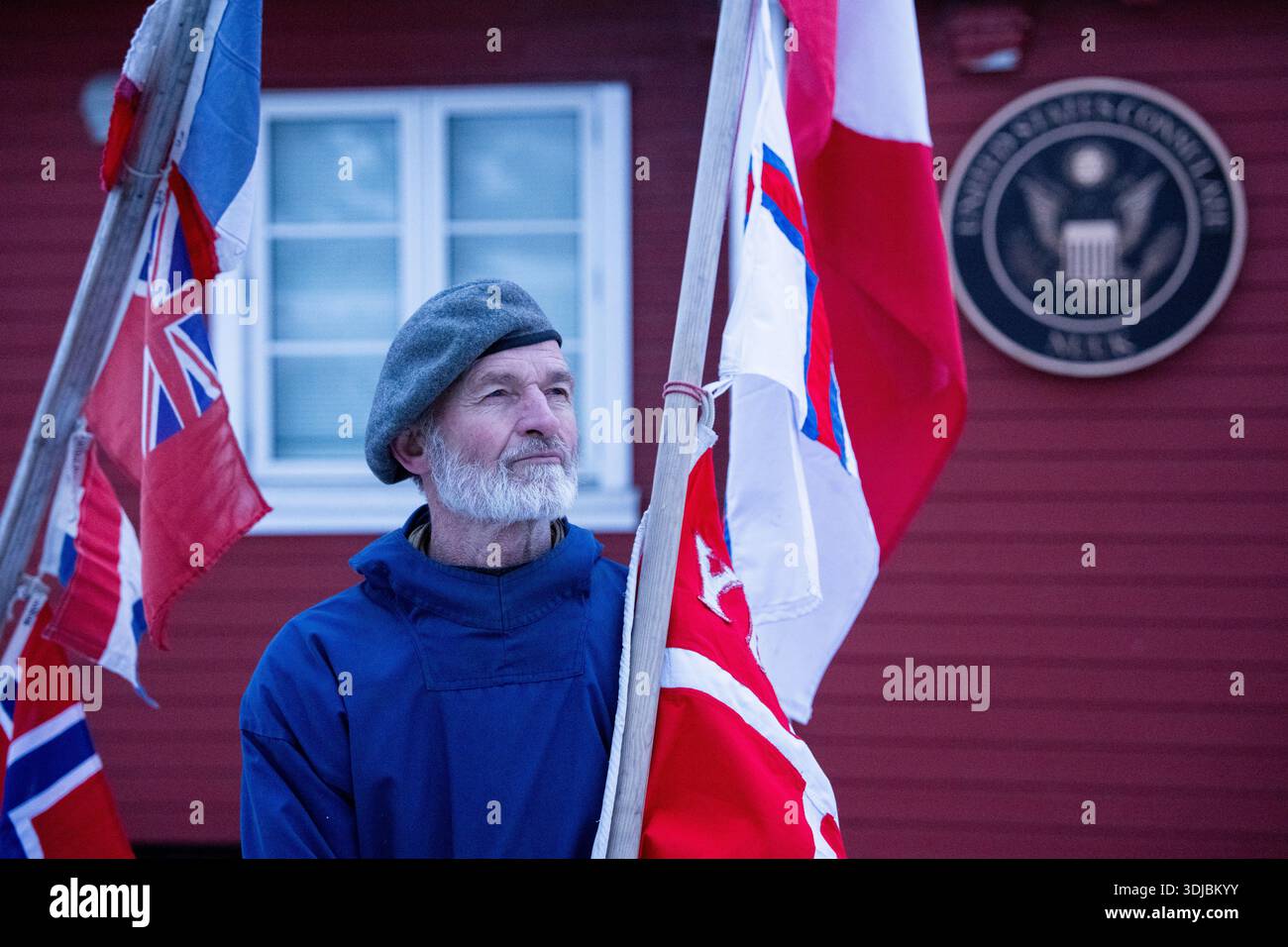 Nuuk, Greenland 20260124. Jens Erik Kjeldsen holds the flags of Denmark ...