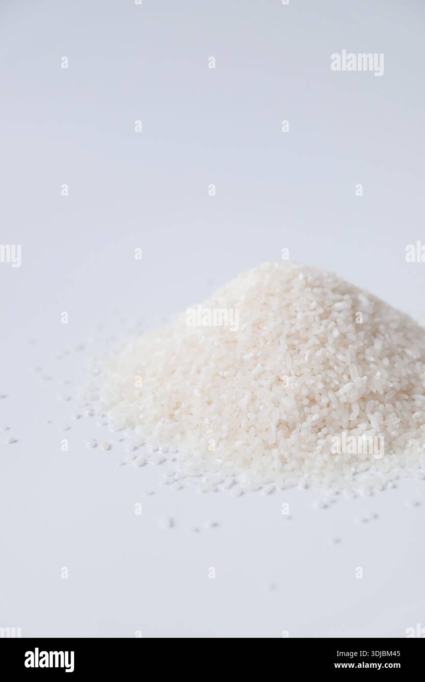Rice grains isolated on white background Stock Photo - Alamy