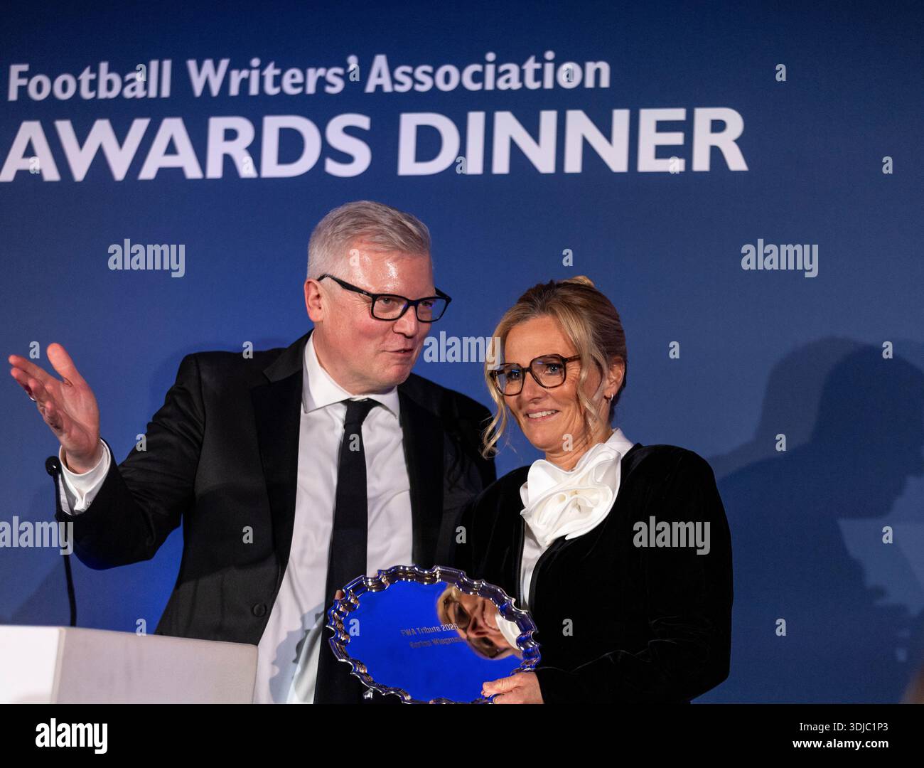 FWA Chairman John Cross hand over the trophy to England women's ...