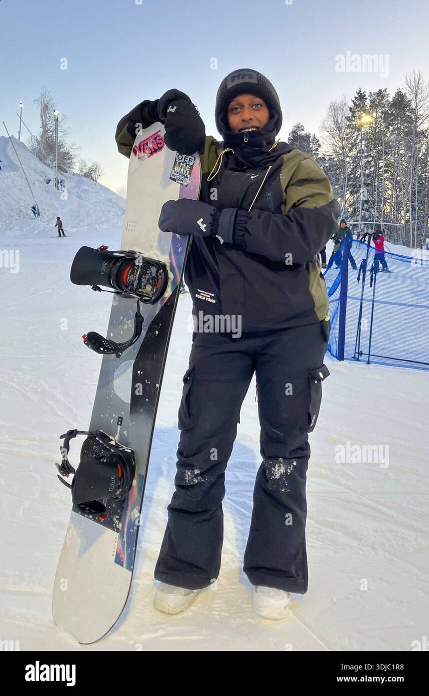 Maryan Hashi poses with her snowboard at Vedbobacken in Vasteras ...