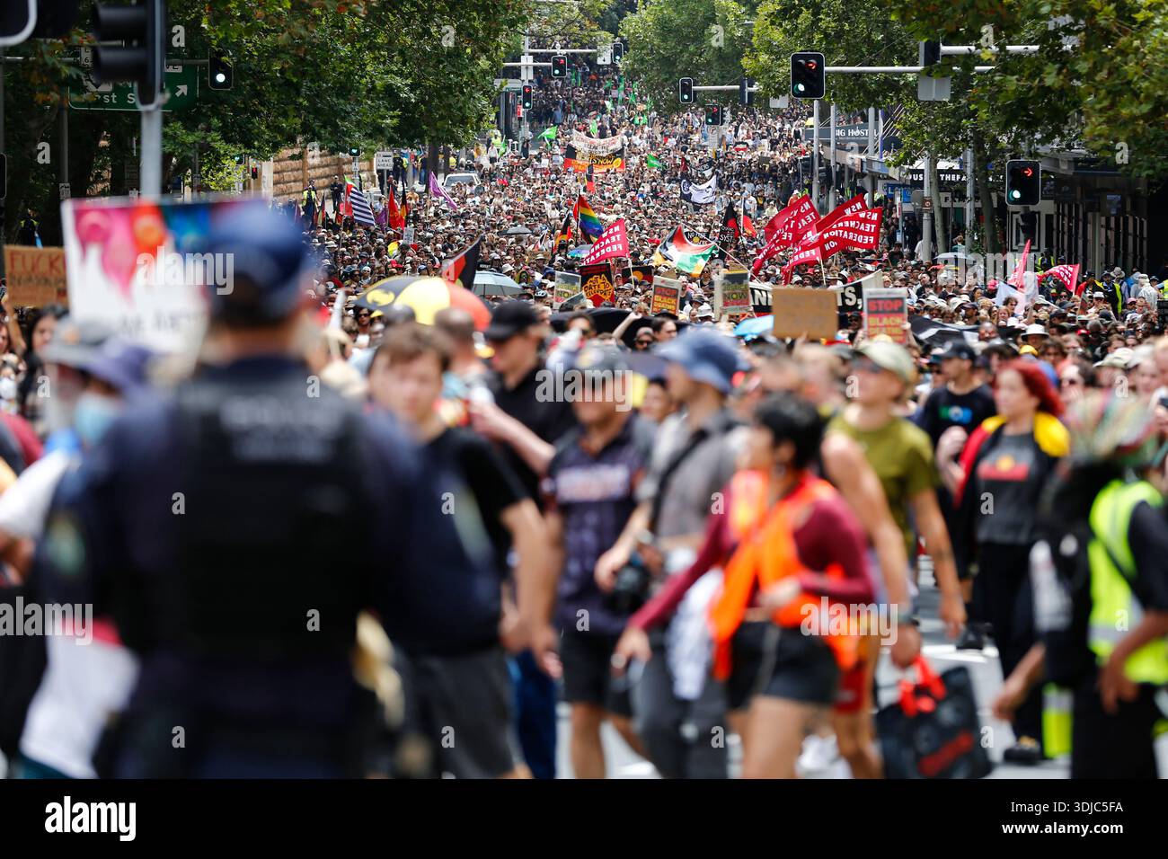Protesters march through the CBD during an Invasion Day rally ...