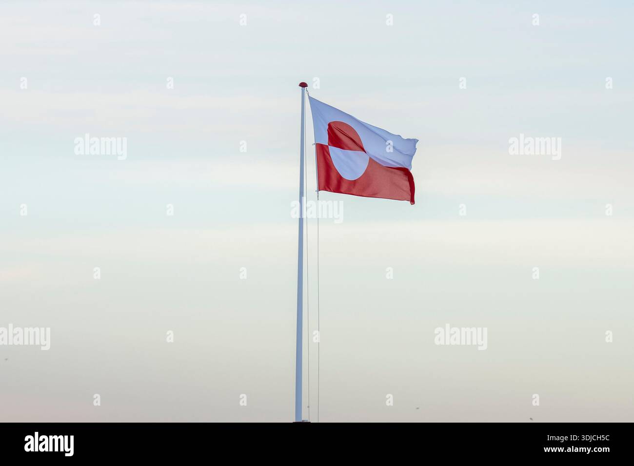 Nuuk, Greenland 20260125. A Greenlandic flag flutters in the wind in ...