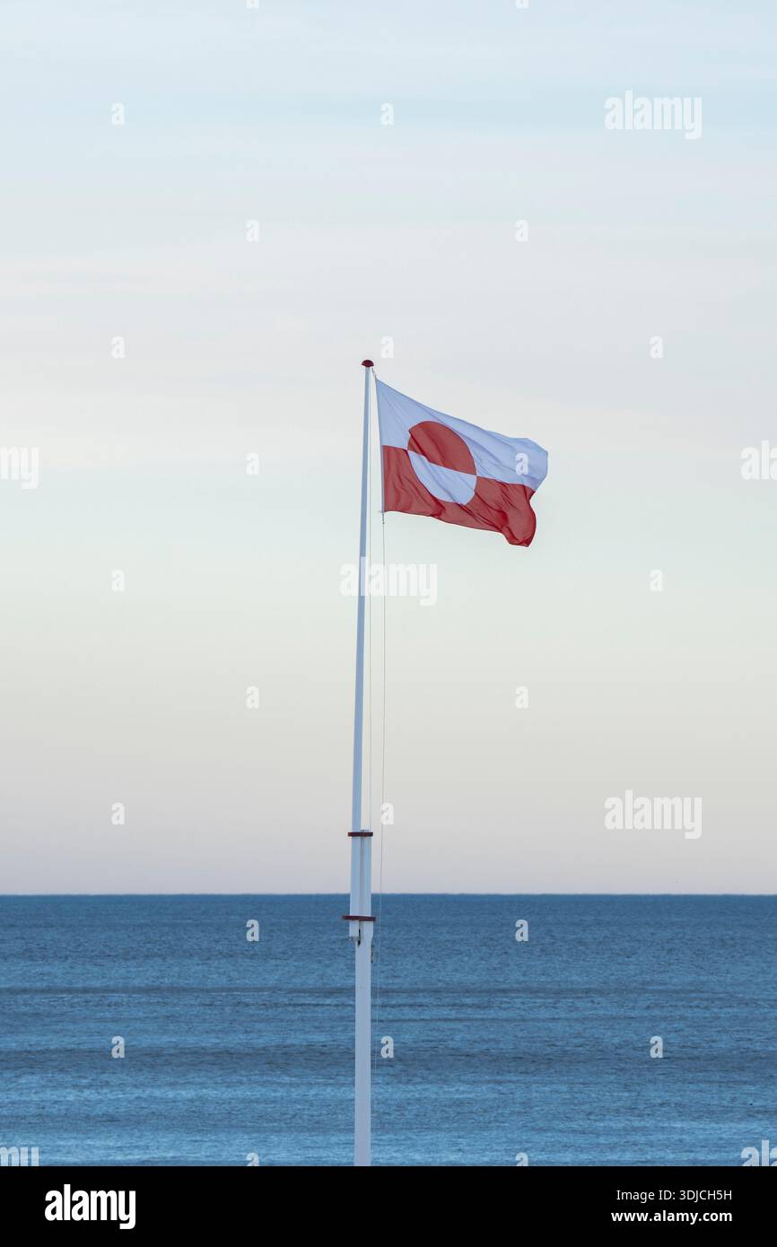 Nuuk, Greenland 20260125. A Greenlandic flag flutters in the wind in ...