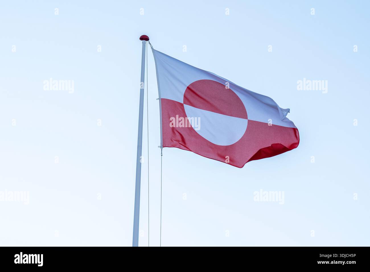 Nuuk, Greenland 20260125. A Greenlandic flag flutters in the wind in ...