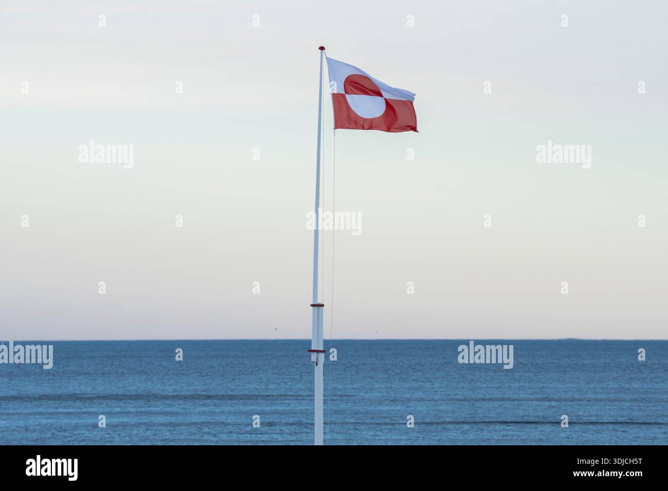 Nuuk, Greenland 20260125. A Greenlandic flag flutters in the wind in ...