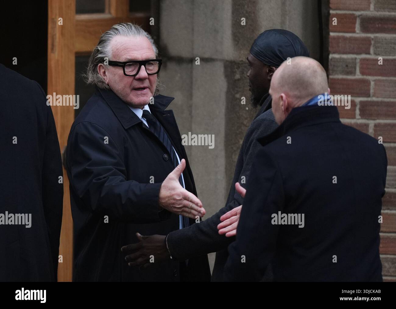 Peter Jackson arriving for the funeral service for Terry Yorath at the ...