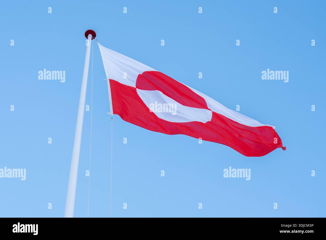 Nuuk, Greenland 20260125. A Greenlandic flag flutters in the wind in ...