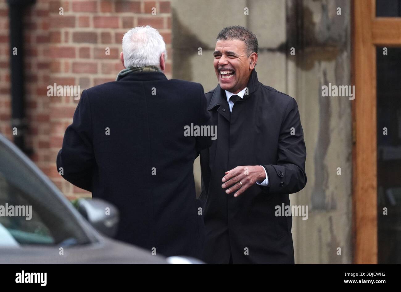 Chris Kamara (right) and Eddie Gray following the funeral service for ...