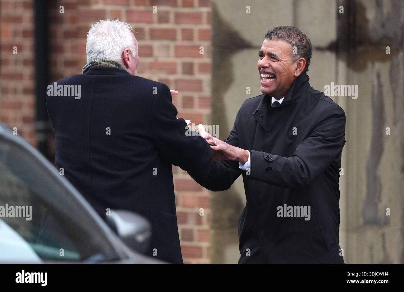 Chris Kamara (right) and Eddie Gray following the funeral service for ...
