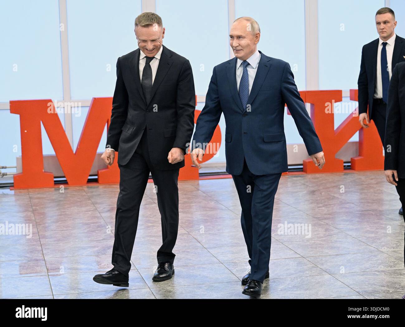 Russian President Vladimir Putin (center) and MIPT Rector Dmitry ...