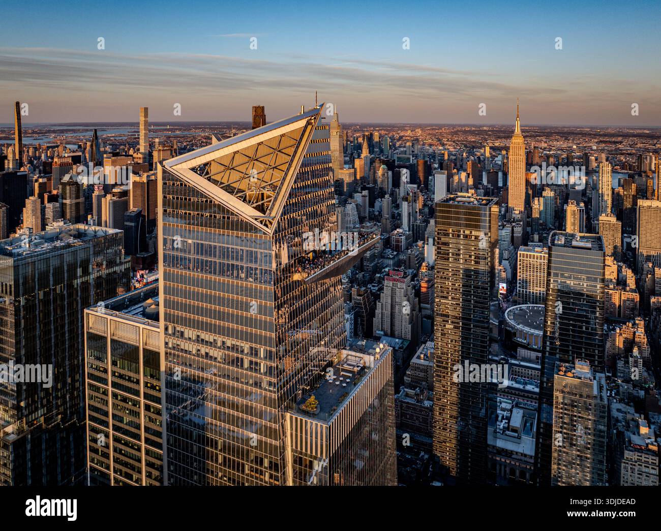 Aerial view of the golden hour casts long shadows across the ...