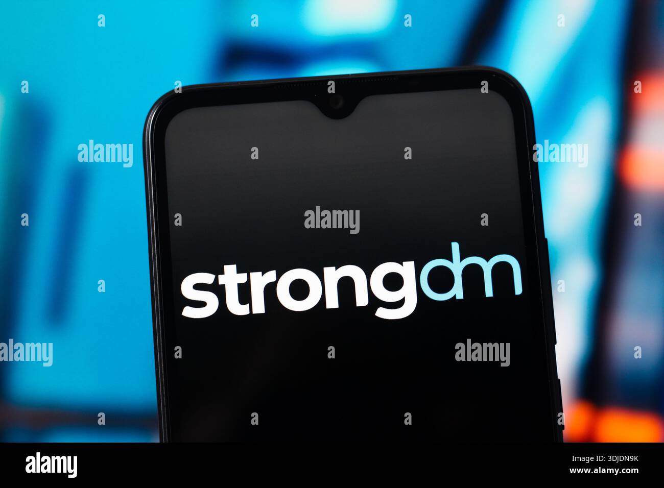 In this photo illustration, the StrongDM (Strong DM) logo is seen ...