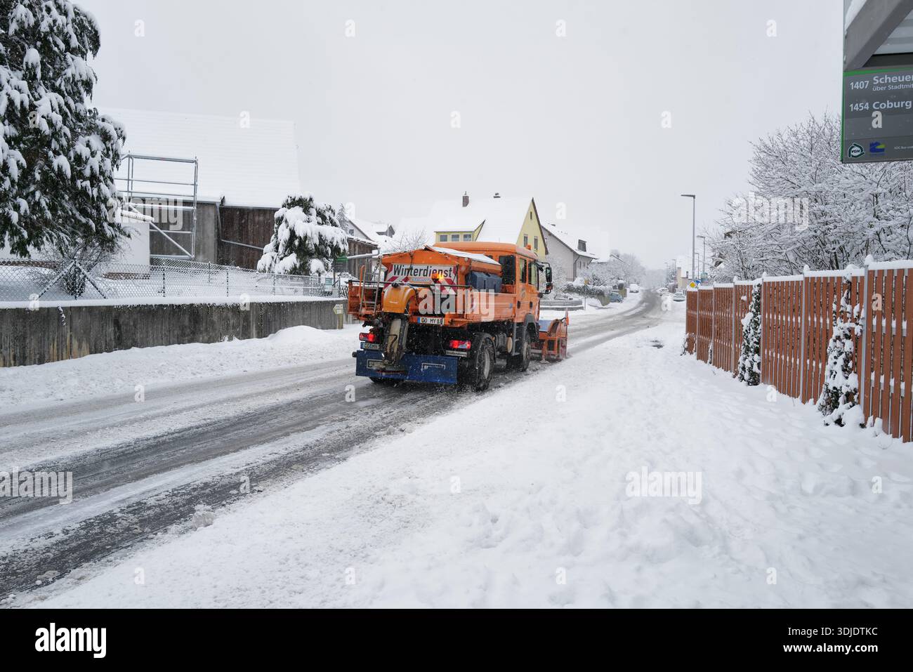 Coburg, Germany. 26th Jan, 2026. A snow plough clears the road after a ...