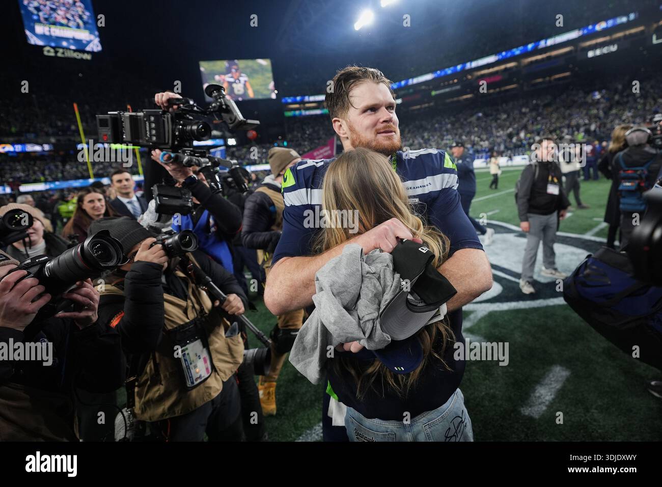 Seattle Seahawks quarterback Sam Darnold hugs his fiancée Katie ...