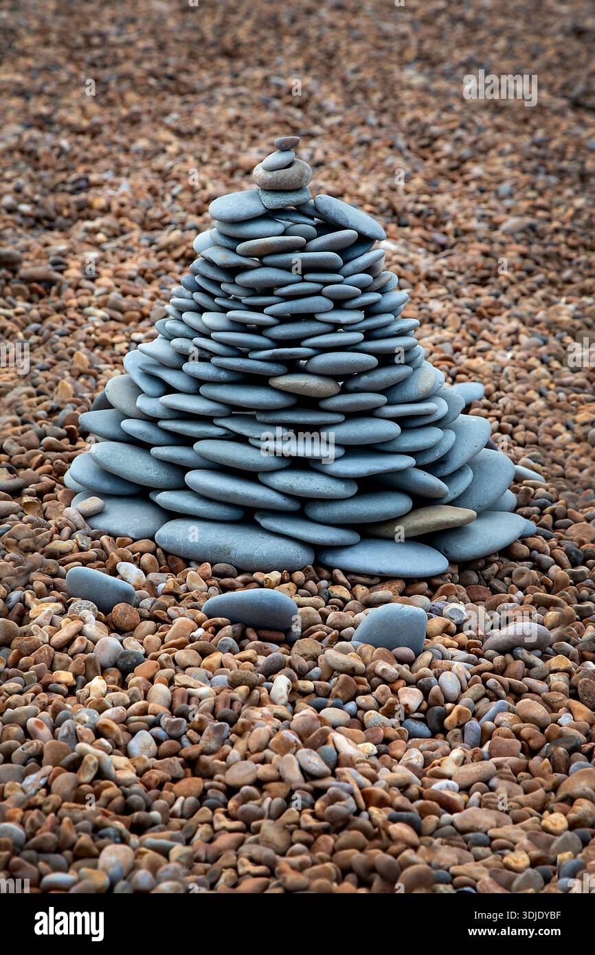 SMALL GREY PEBBLE MOUNTAIN ON BEACH Stock Photo - Alamy