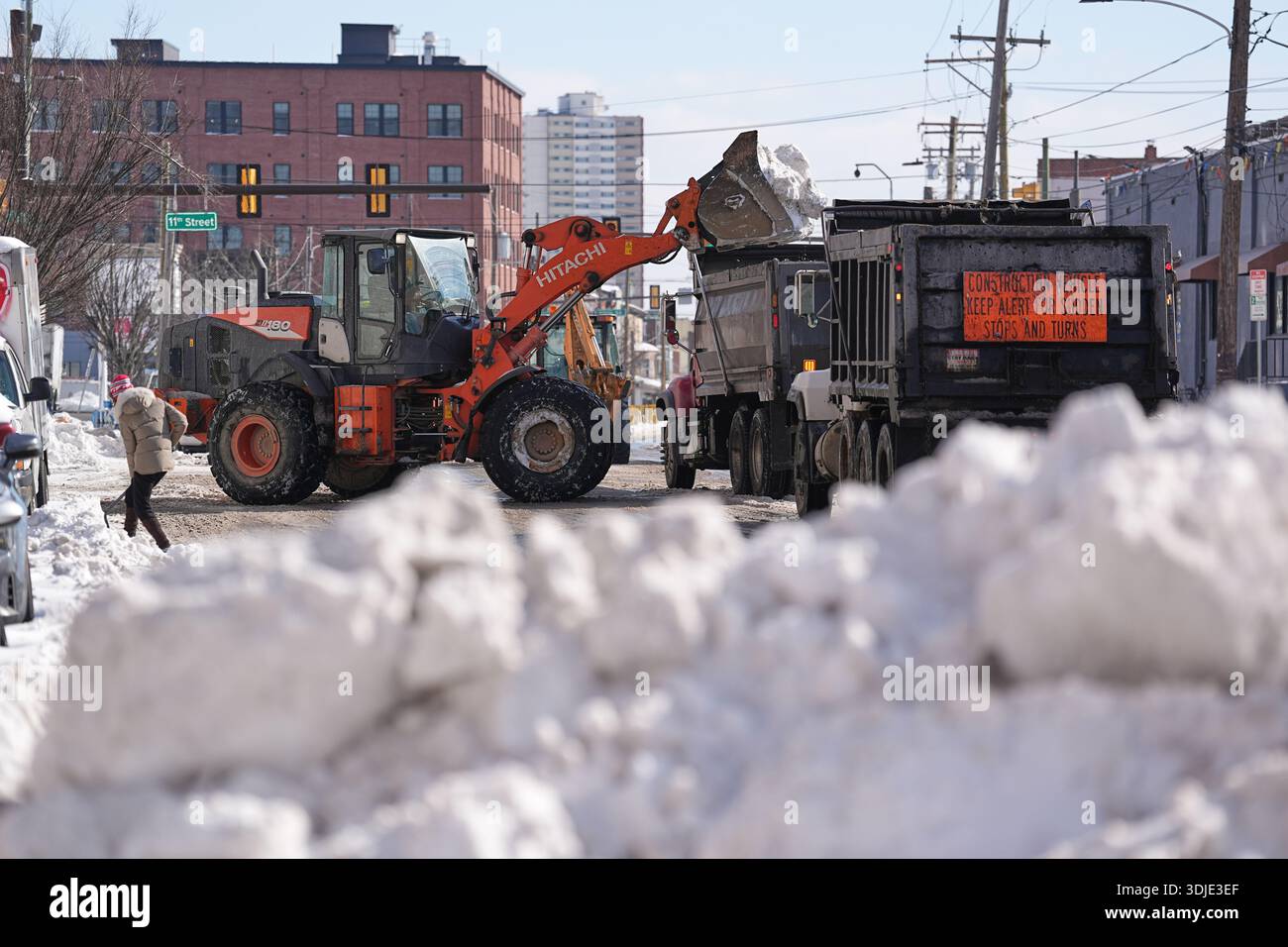 Snow is removed in the aftermath of a winter storm in Philadelphia ...