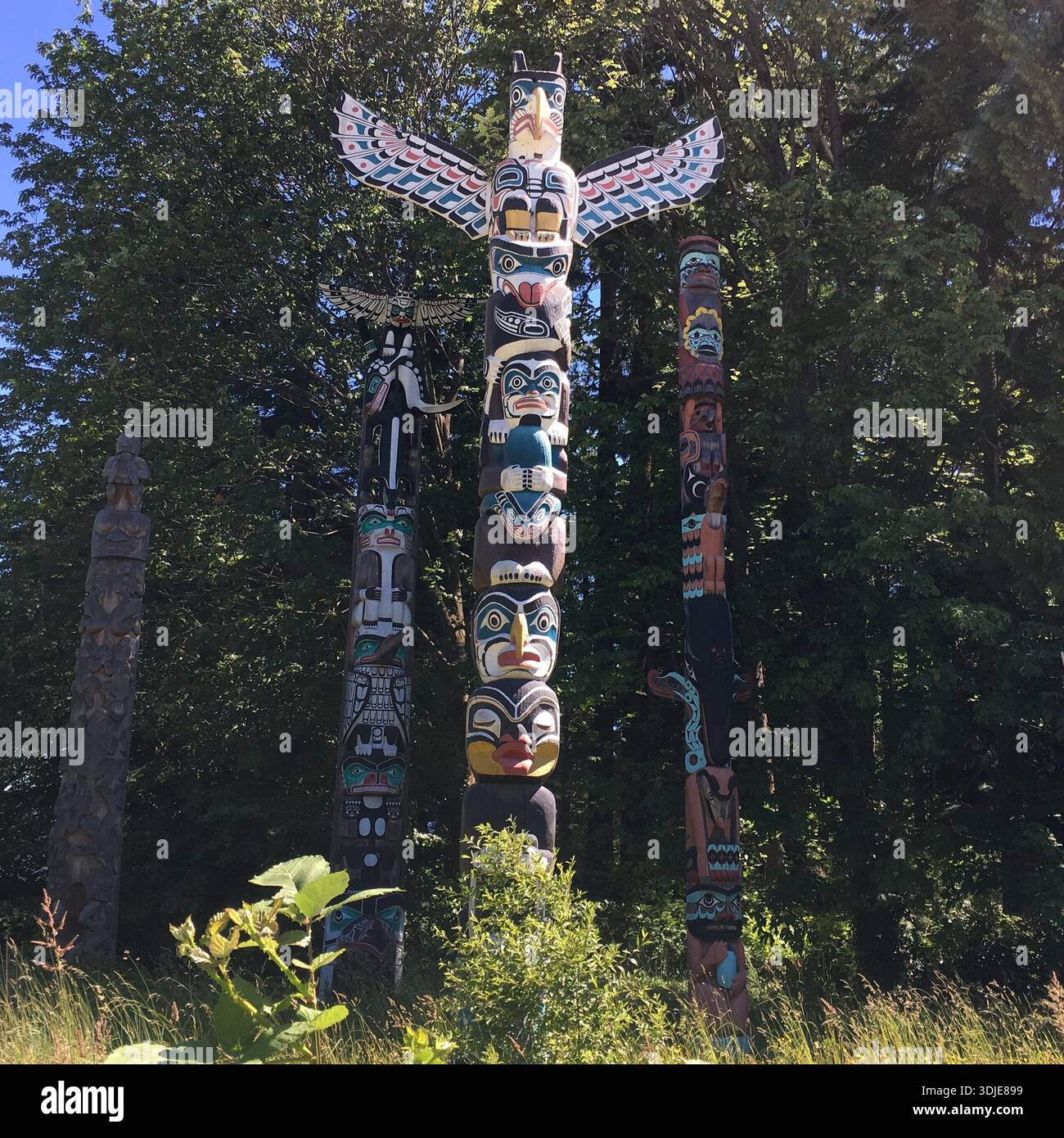 Decorative native Totem Poles in Stanley Park, Vancouver, Canada Stock ...