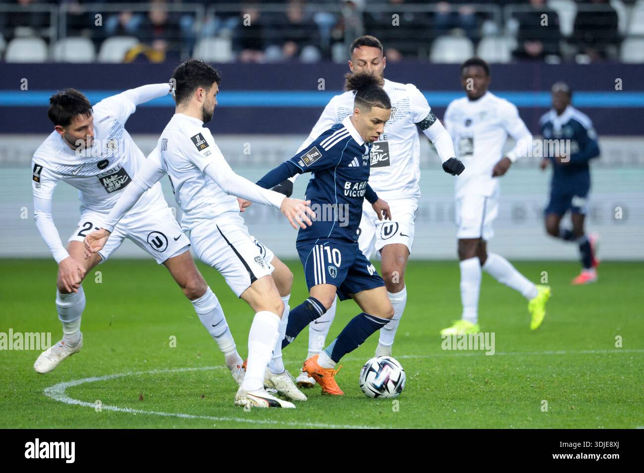 Ilan Kebbal of Paris FC against Jordan Lefort, Louis Mouton, Haris ...