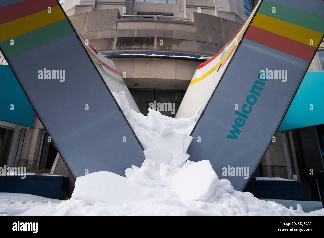 A collapsed awning covered snow in outside of the National Children's ...