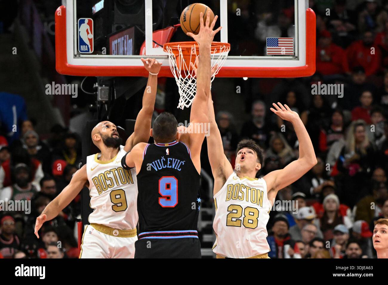 Chicago Bulls center Nikola Vucevic (9) shoots against Boston Celtics ...