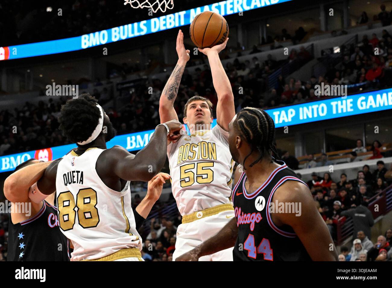 Boston Celtics guard Baylor Scheierman (55) shoots against Chicago ...