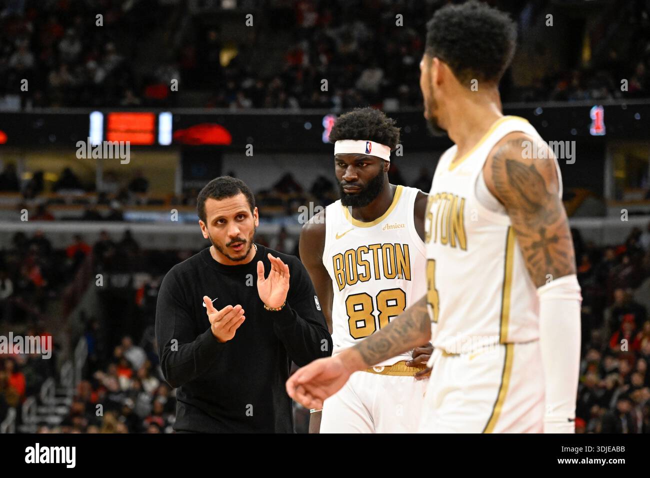 Boston Celtics head coach Joe Mazzulla claps while looking towards ...