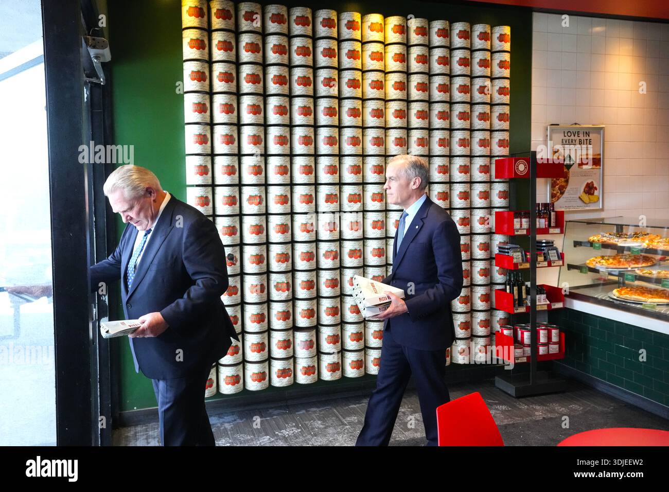 Prime Minister Mark Carney and Ontario Premier Doug Ford order pizza at ...