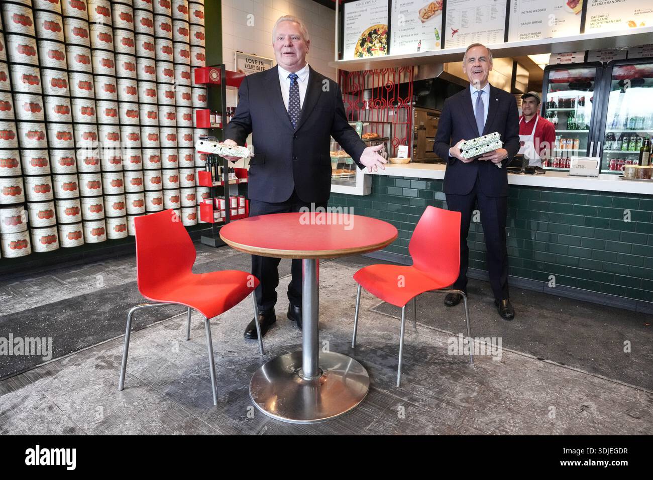 Prime Minister Mark Carney and Ontario Premier Doug Ford speak to the ...