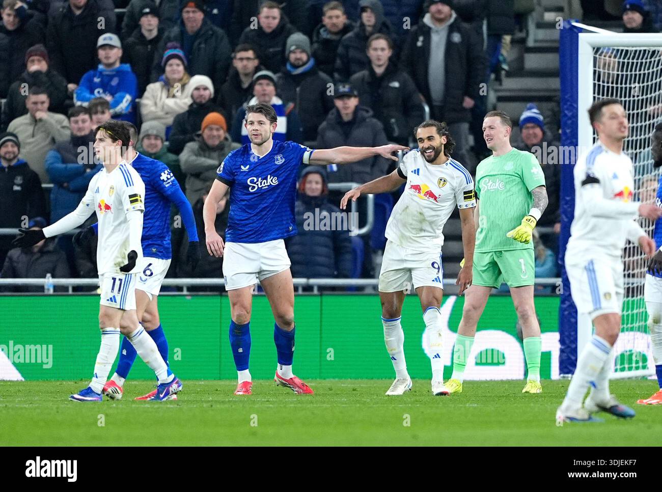 Everton's James Tarkowski shoves Leeds United's Dominic Calvert-Lewin ...