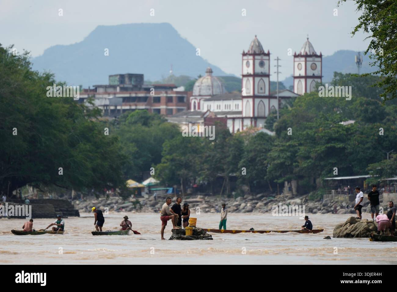 People fish during an annual phenomenon of fish swimming upstream to ...