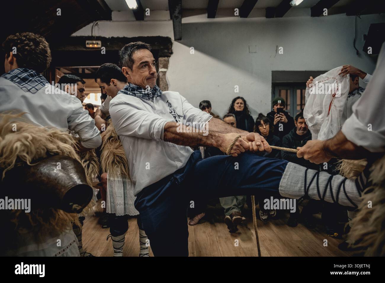 Zubieta, Spain. 26 January, 2026: Men work hard together to secure ...
