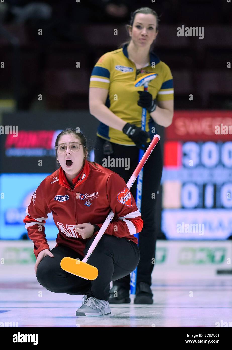 Team Newfoundland & Labrador skip Mackenzie Mitchell, front, yells ...