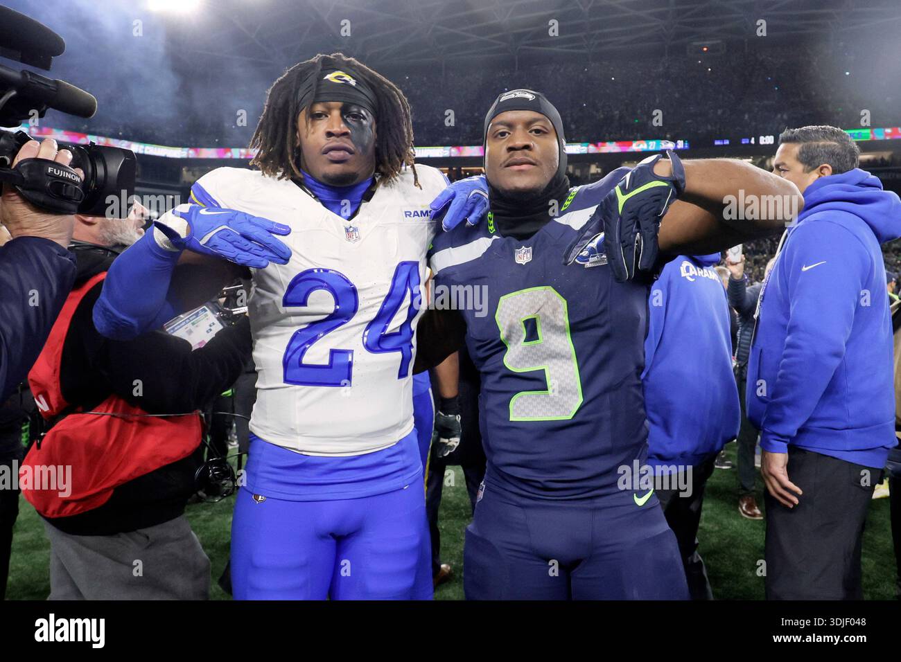 Los Angeles Rams linebacker Elias Neal (24) poses with Seattle Seahawks ...