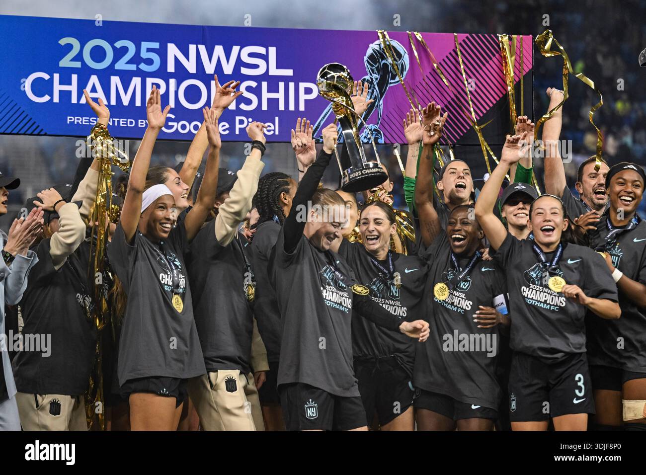 FILE - NJ/NY Gotham FC defender Emily Sonnett, center, lifts the NWSL ...