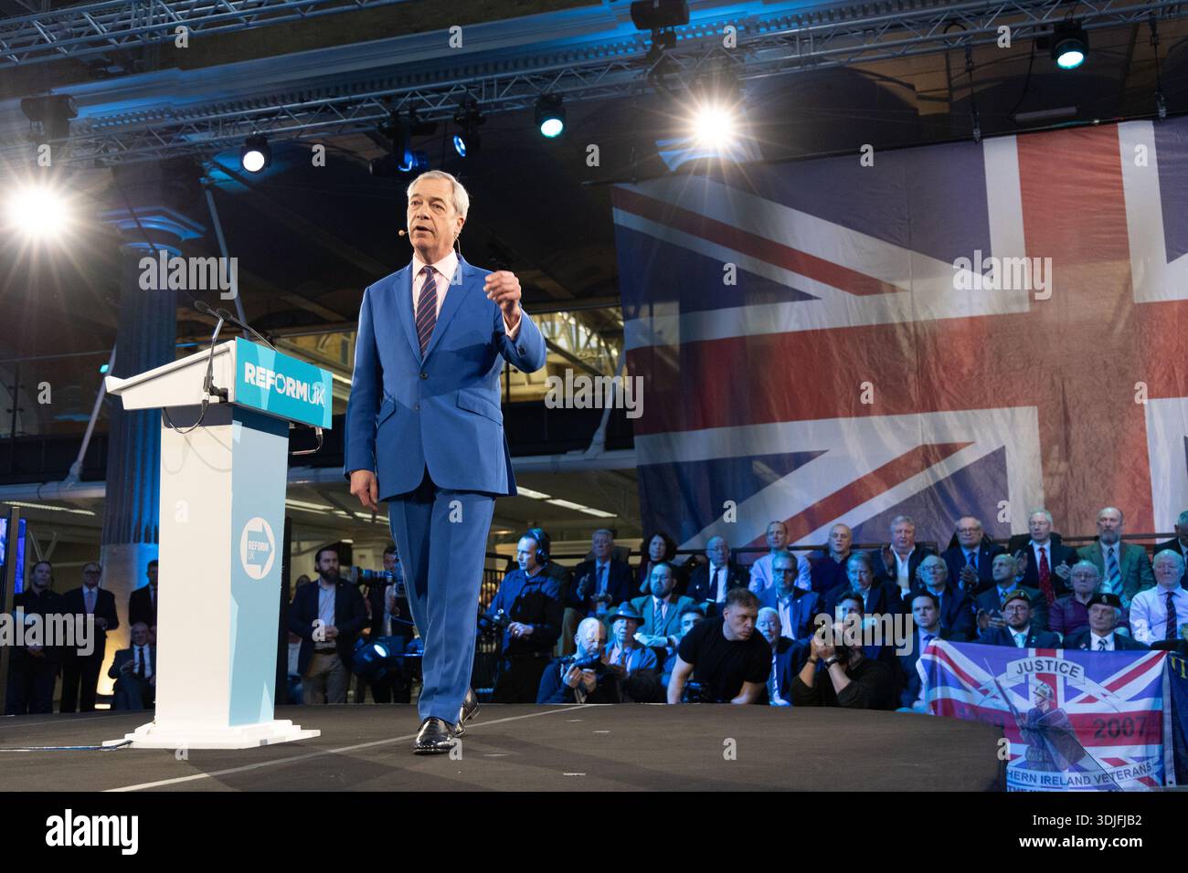 Reform UK leader Nigel Farage speaks during a Veterans for Reform rally ...