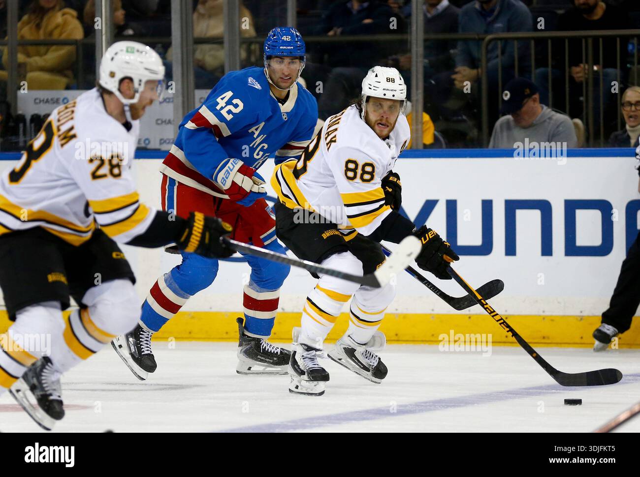 Boston Bruins forward David Pasternak (88), New York Rangers center ...