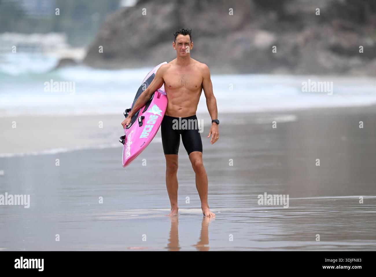 Surf Life Saving Iron Man champion Ali Day is seen posing for a photo ...