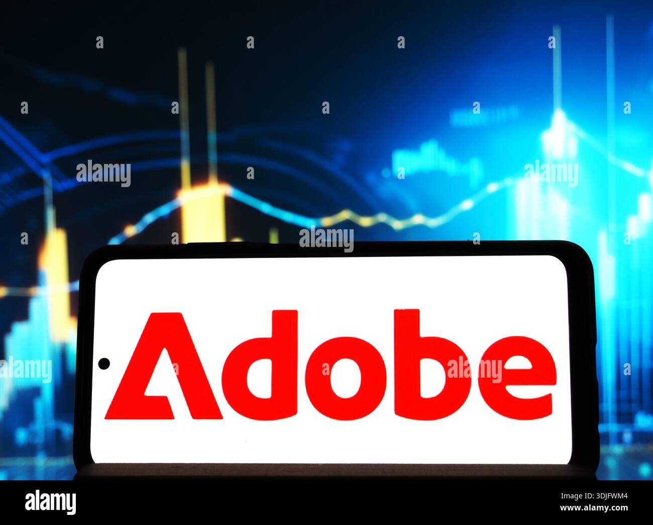 In this photo illustration, the Adobe Inc. logo seen displayed on a ...