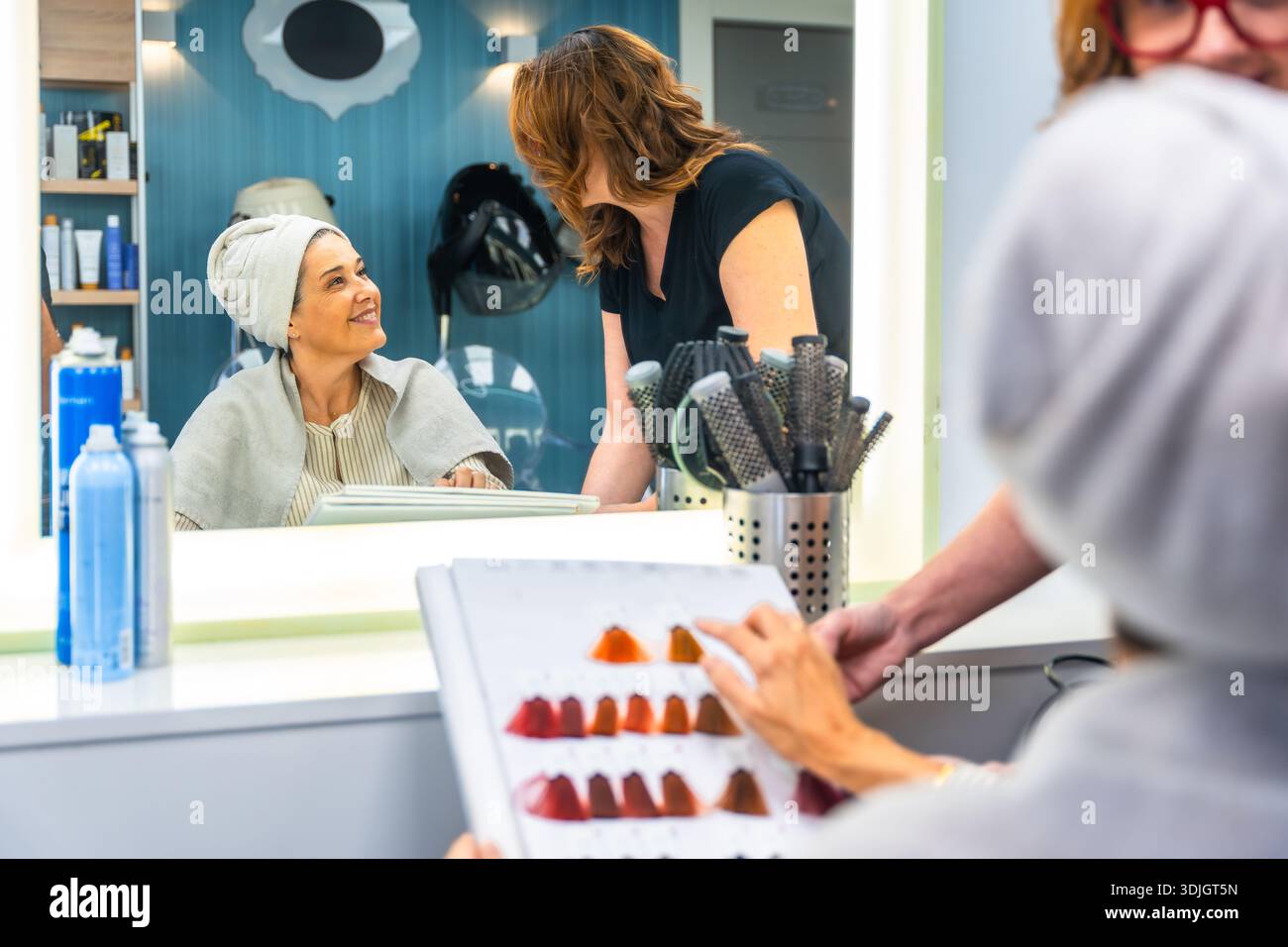 Client choosing hair dye color in hair salon Stock Photo - Alamy