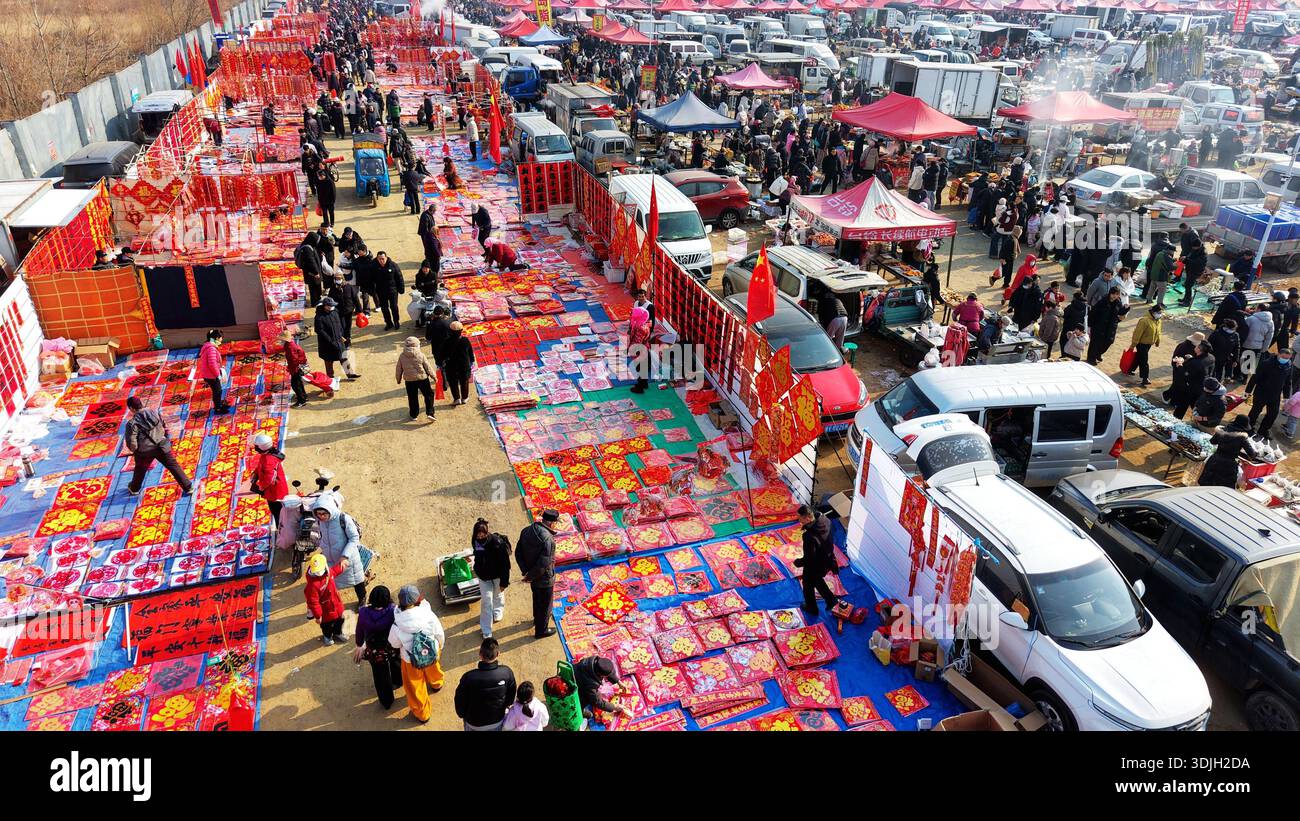 Shoppers crowd at Lingshanwei market for Lunar New Year goods in ...