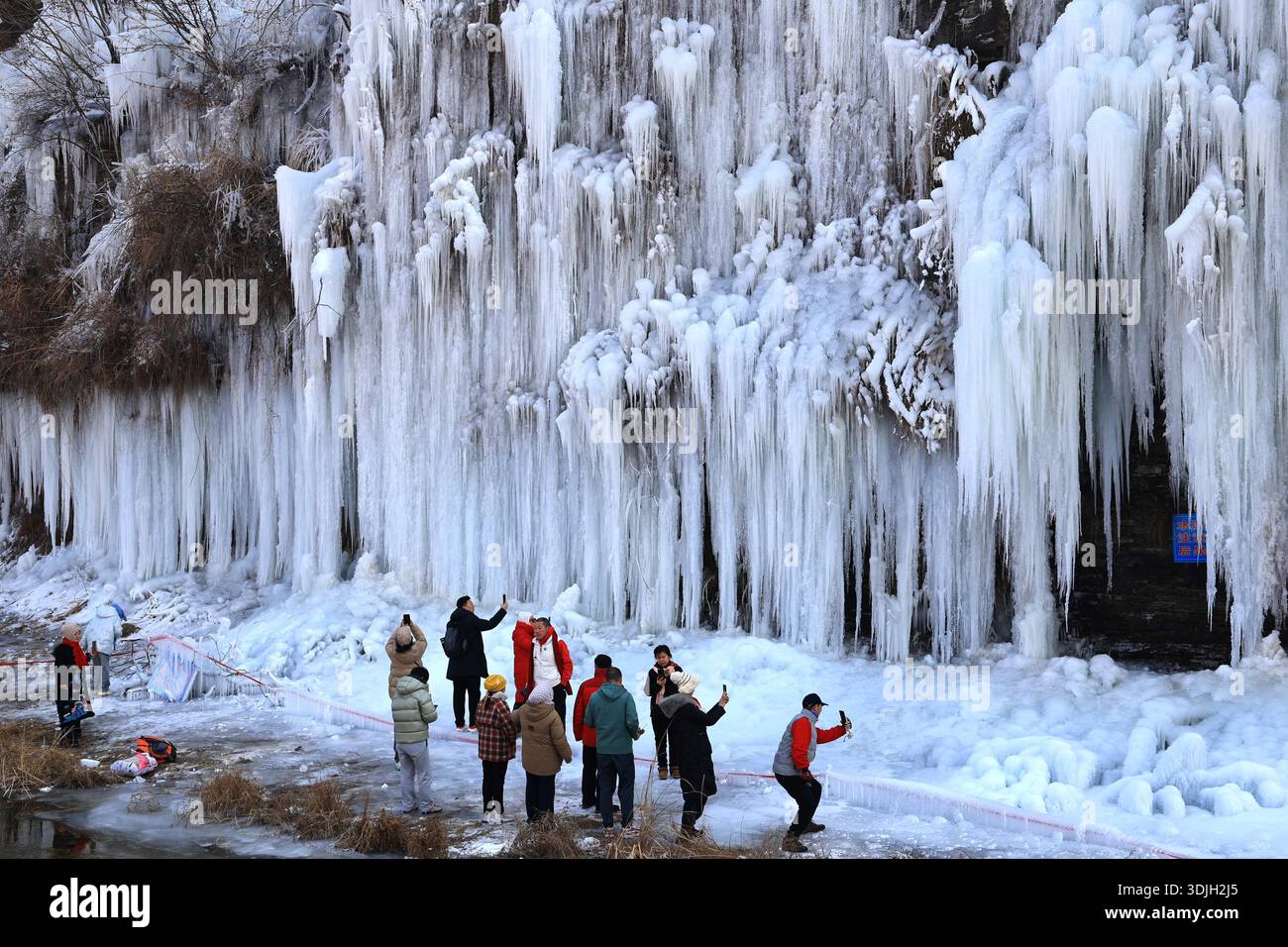 Ice formations decorate the cliffs in Yandi Village, Shanting District ...