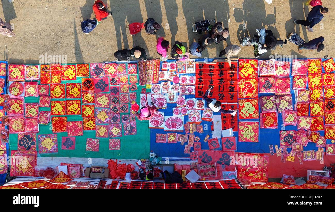 Shoppers crowd at Lingshanwei market for Lunar New Year goods in ...