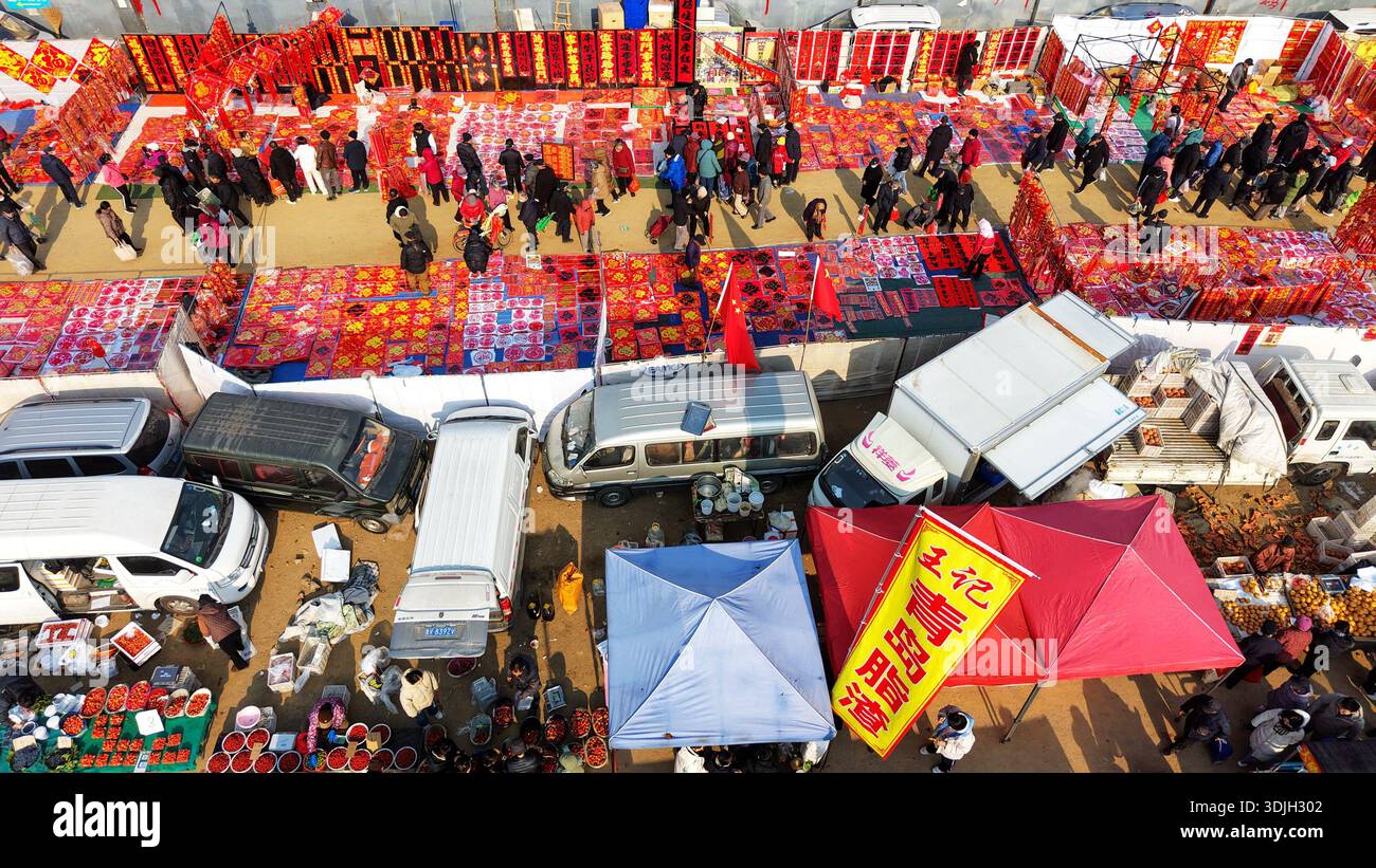Shoppers crowd at Lingshanwei market for Lunar New Year goods in ...