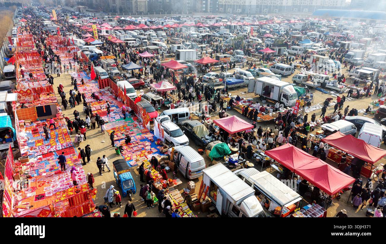 Shoppers crowd at Lingshanwei market for Lunar New Year goods in ...