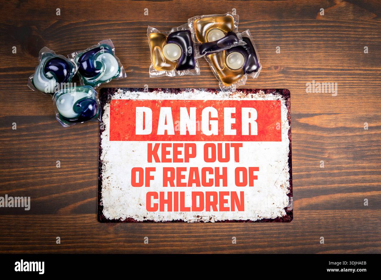 DANGER KEEP OUT OF REACH OF CHILDREN Warning Sign With Laundry ...