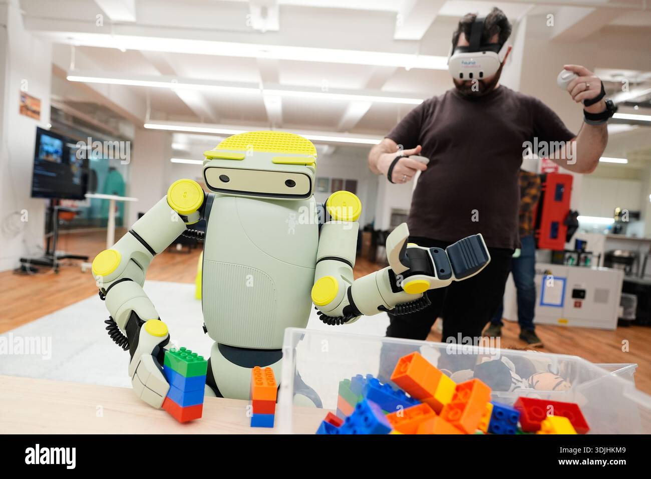 Kel Guerin, Fauna Robotics VP of platform architecture, demonstrates ...