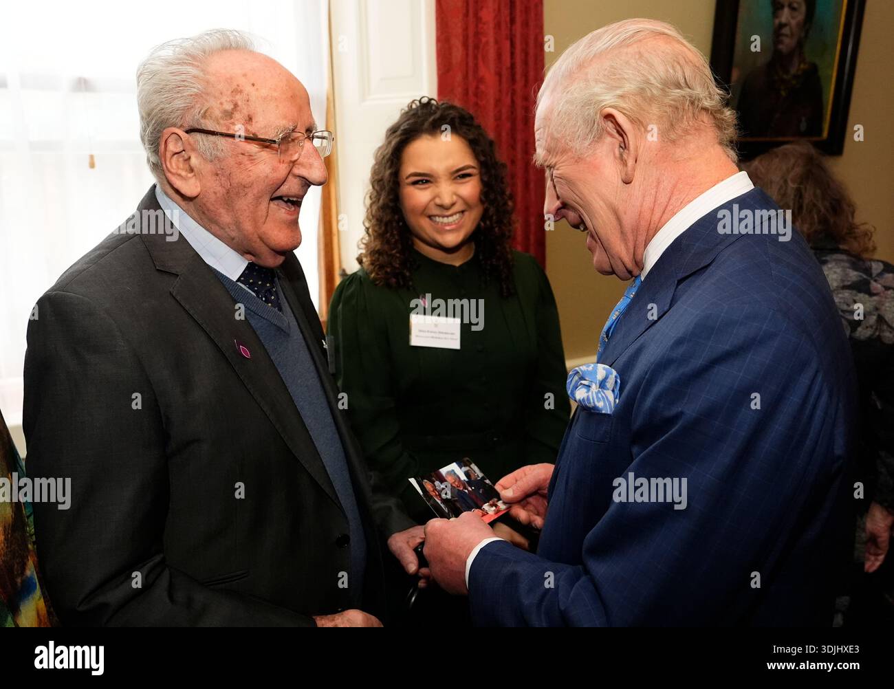 Ivor Perl hands King Charles III a photograph pf their previous meeting ...