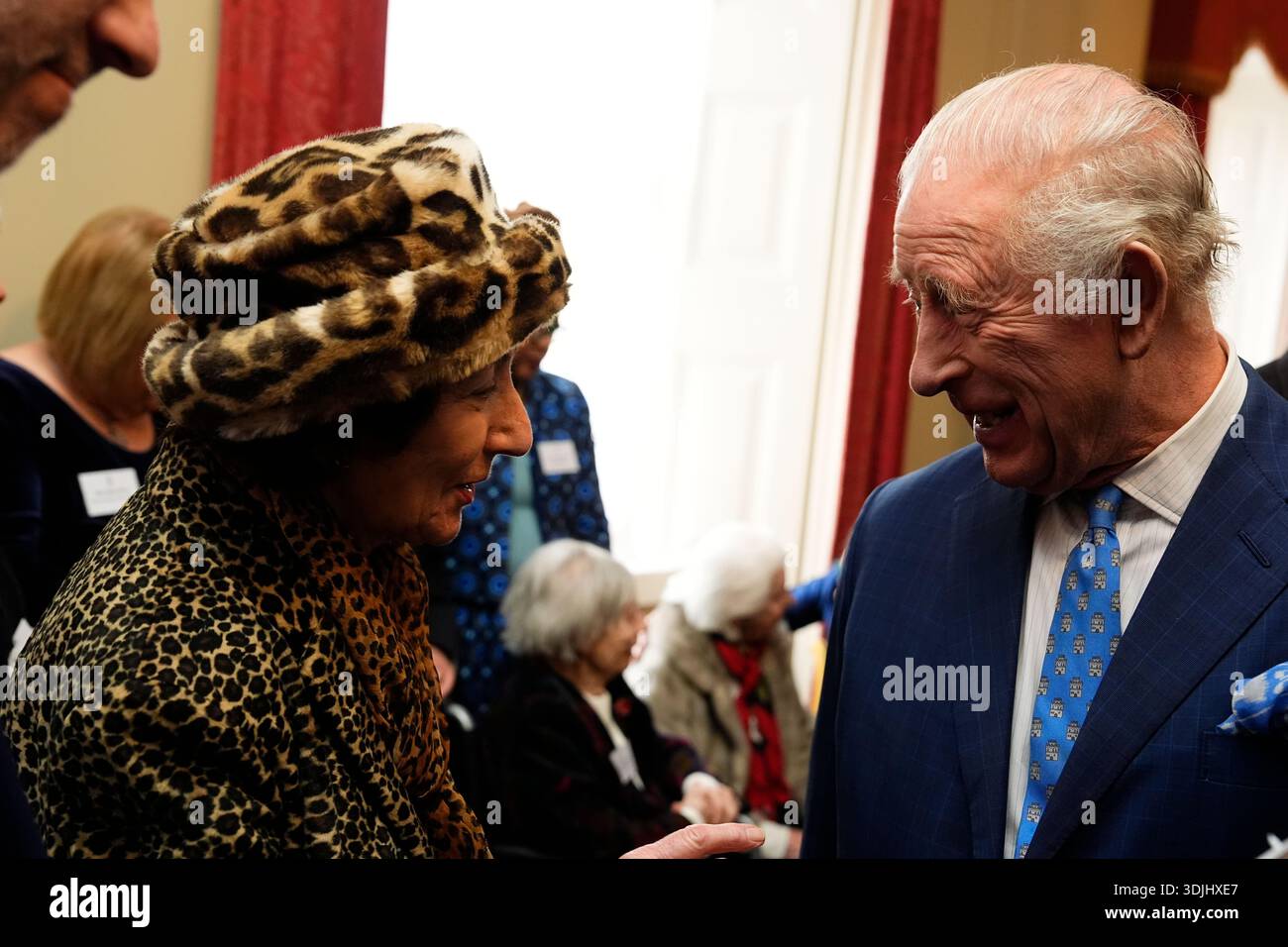 King Charles III speaks with Shari Goldberg during a reception at ...