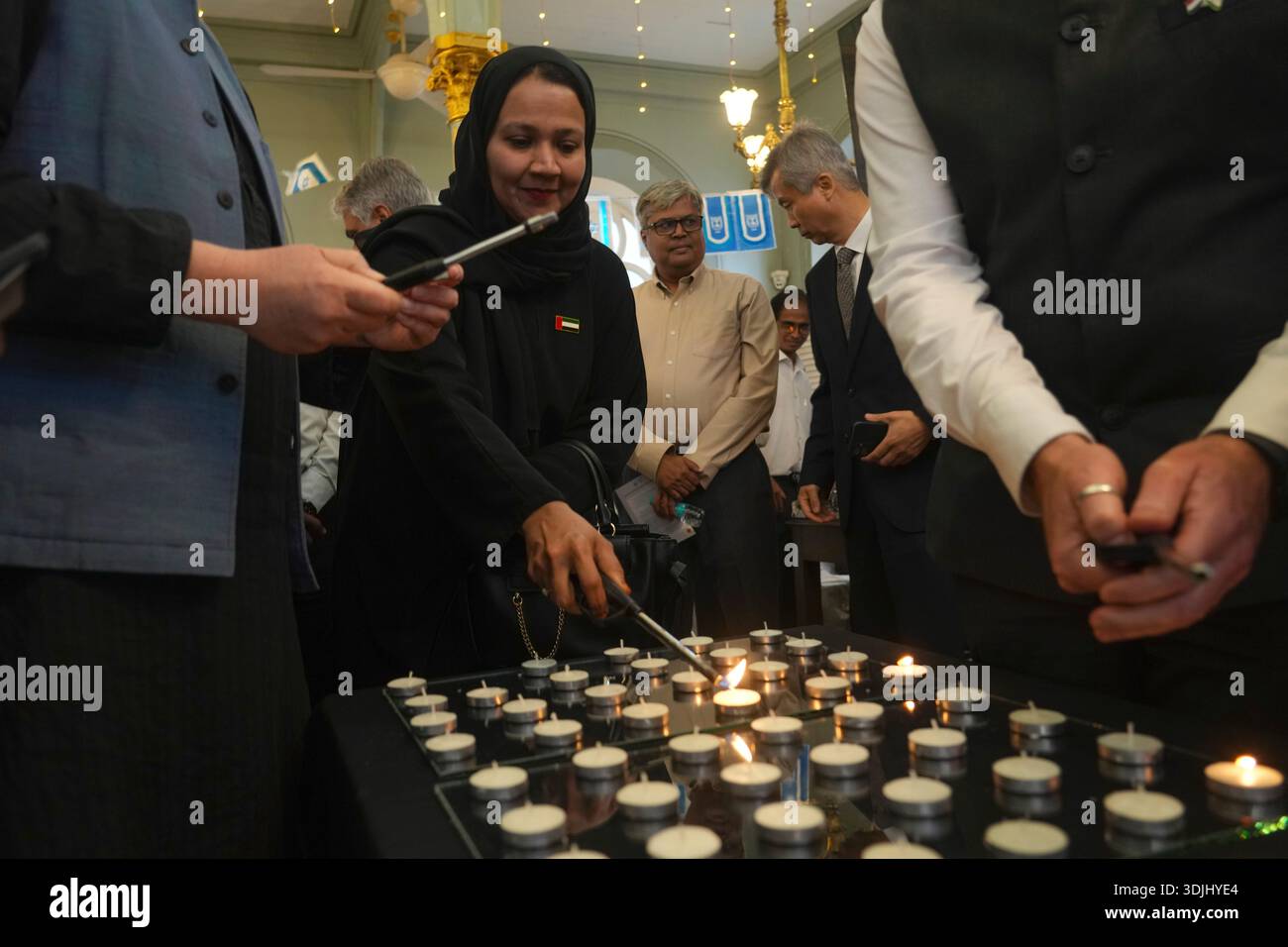 Delegates light the candles to mark International Holocaust Remembrance ...