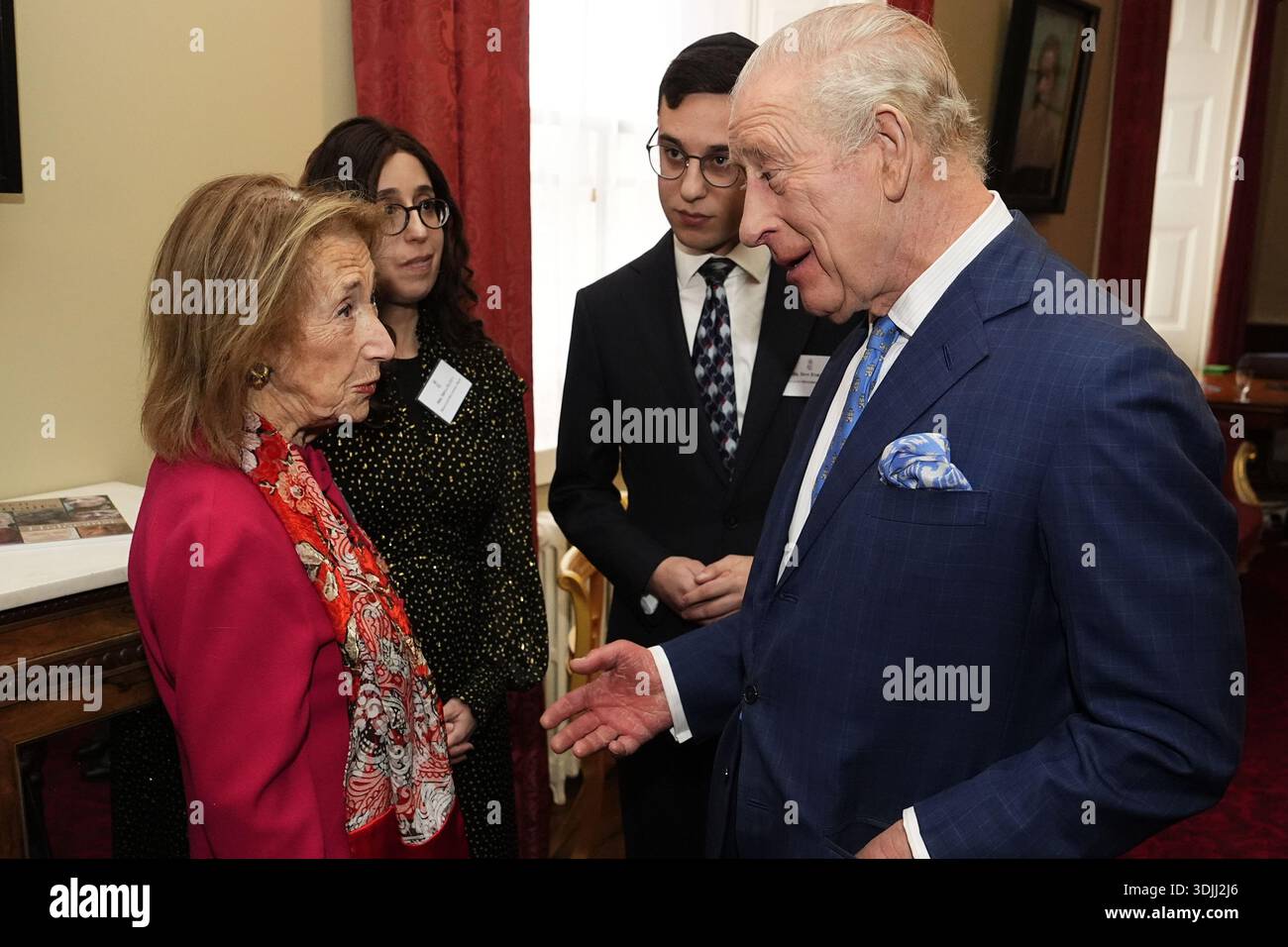 Britain's King Charles III speaks with Holocaust survivor Hannah Lewis ...